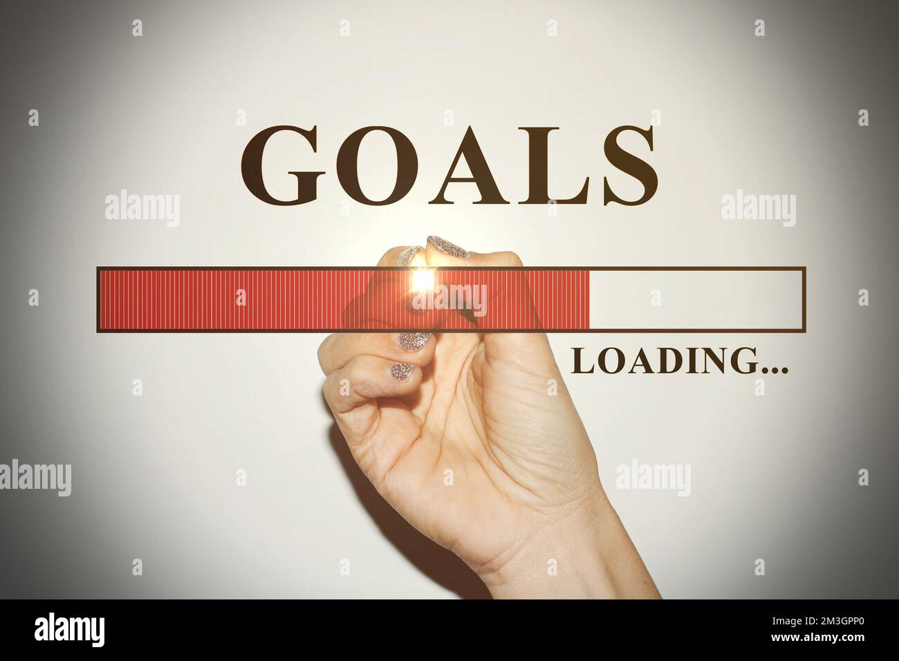 Woman hand with glitter nails showing a Loading Bar with the text ...