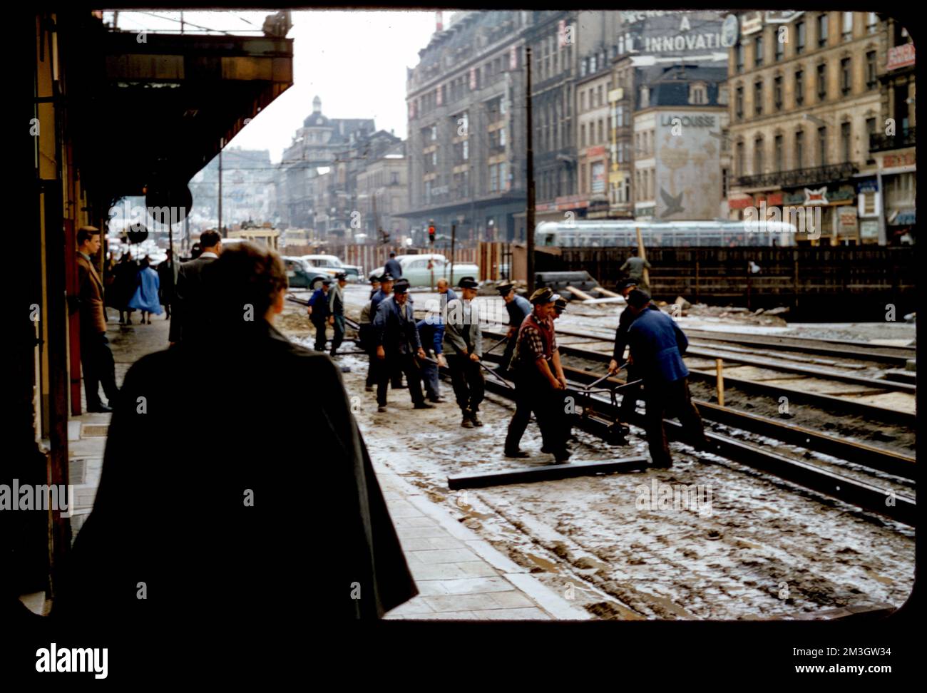 Men working in street, Belgium , Road construction, Laborers, Cities ...