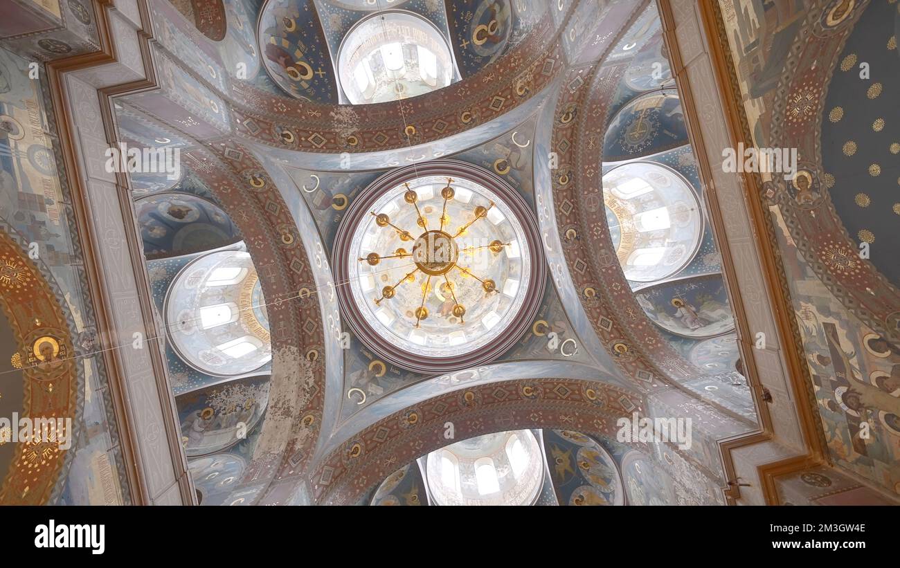 Incredible view of old interior of the ceiling decorated by religious ...