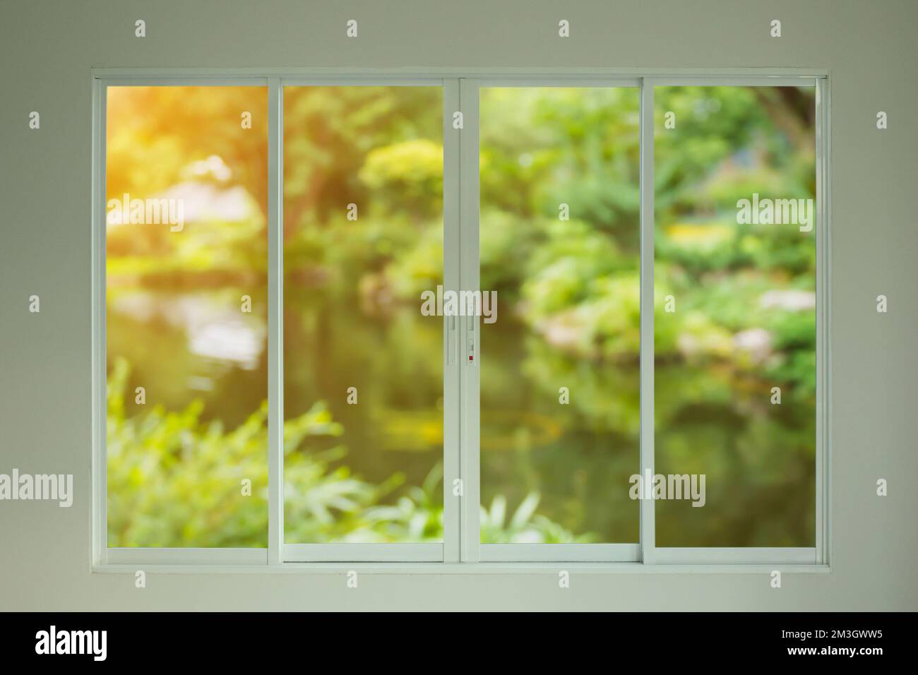 green garden view through the window Stock Photo - Alamy