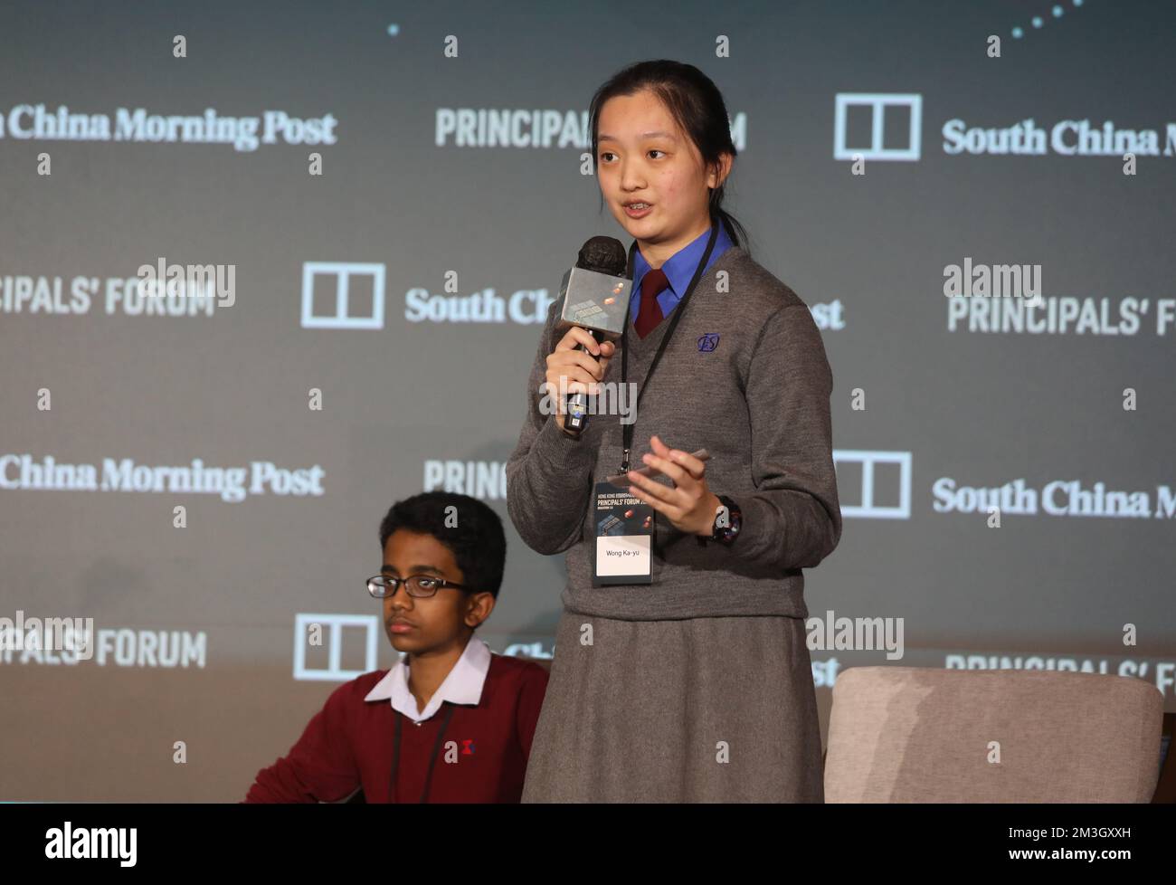 Student debaters Vijay Narayanan (left) of Island School and Ka-yu Wong ...