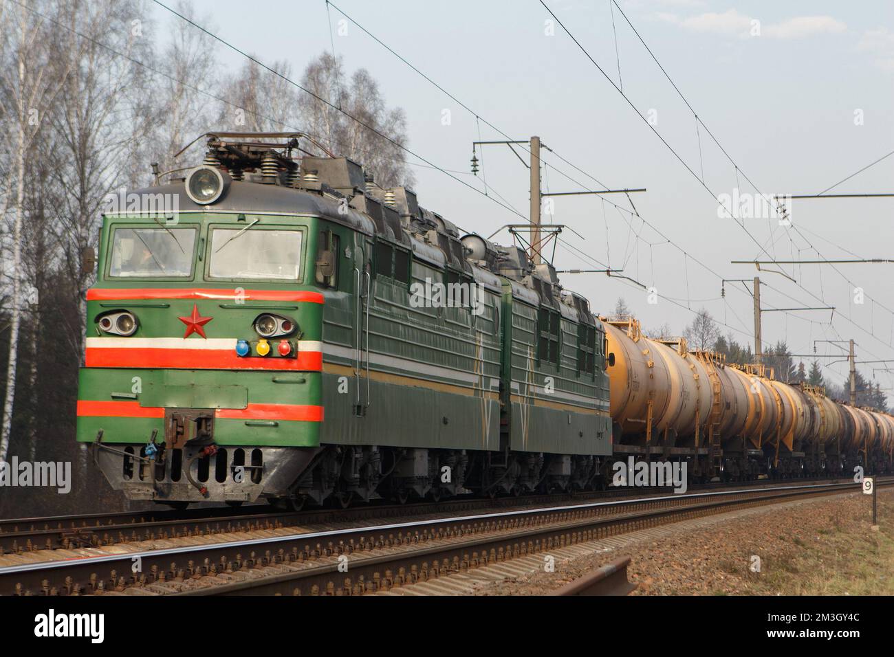 Train locomotive on railway tracks Stock Photo - Alamy