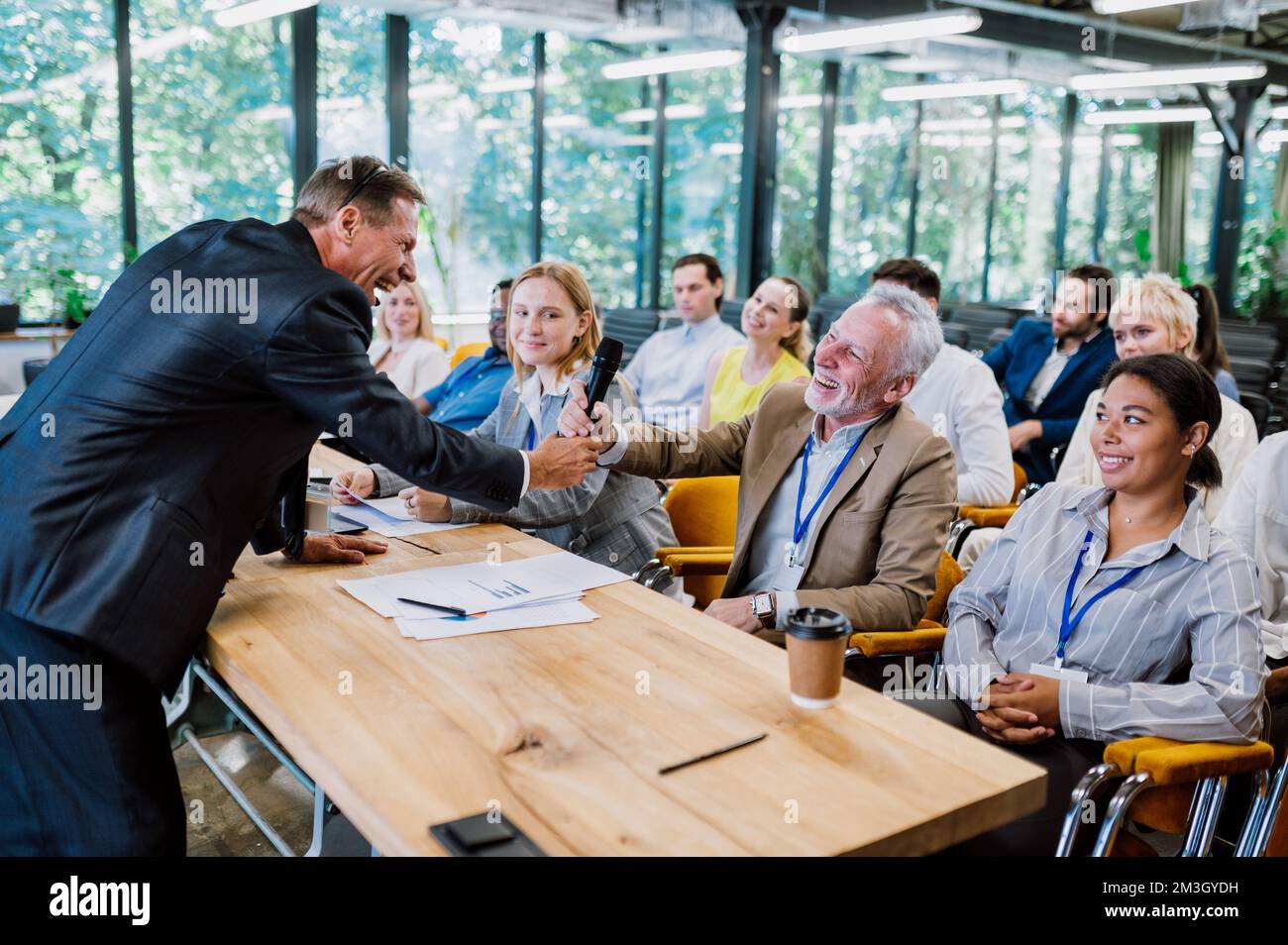 Cinematic image of a conference meeting. Business people sitting in a ...