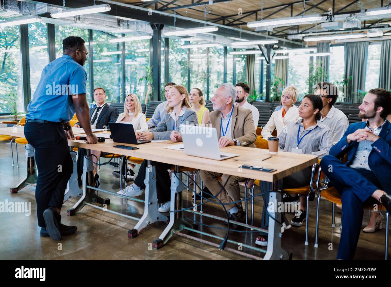 Cinematic image of a conference meeting. Business people sitting in a ...