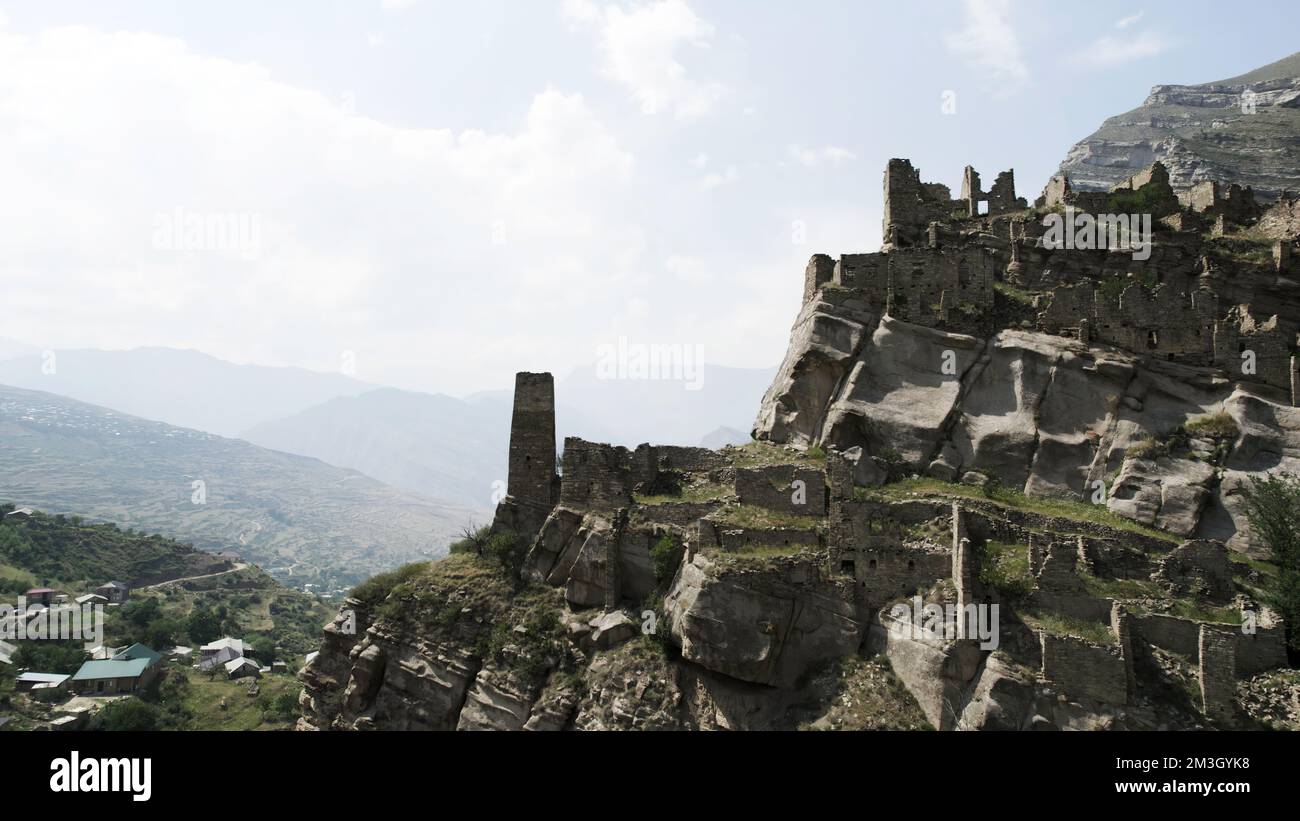 Top view of historical stone ruins on background of mountains. Action ...