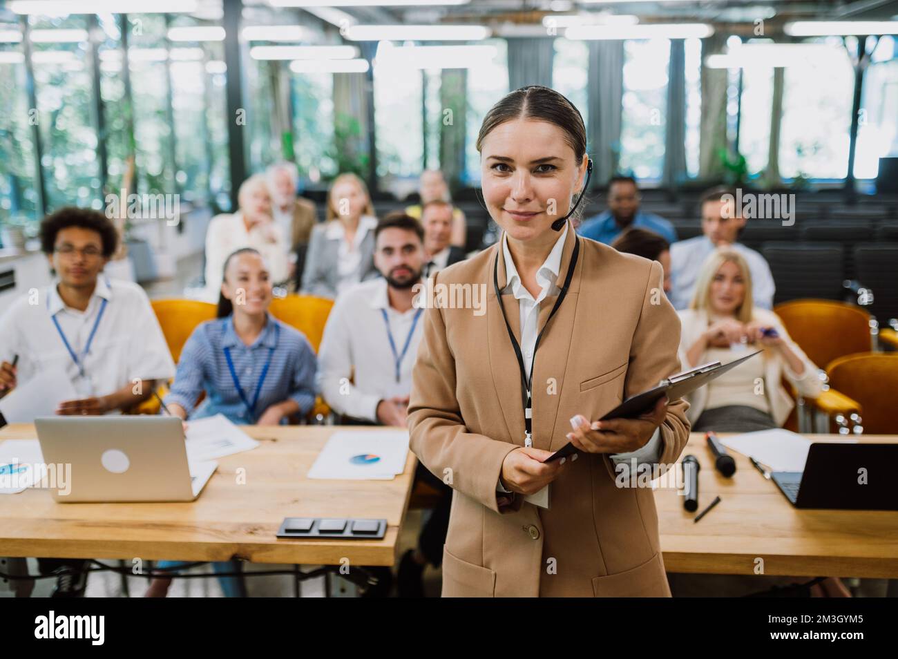 Cinematic image of a conference meeting. Business people sitting in a ...