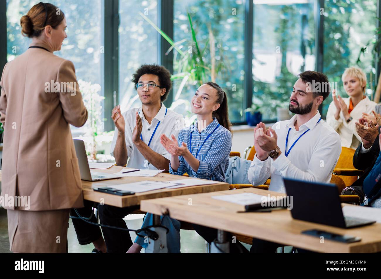 Cinematic image of a conference meeting. Business people sitting in a ...