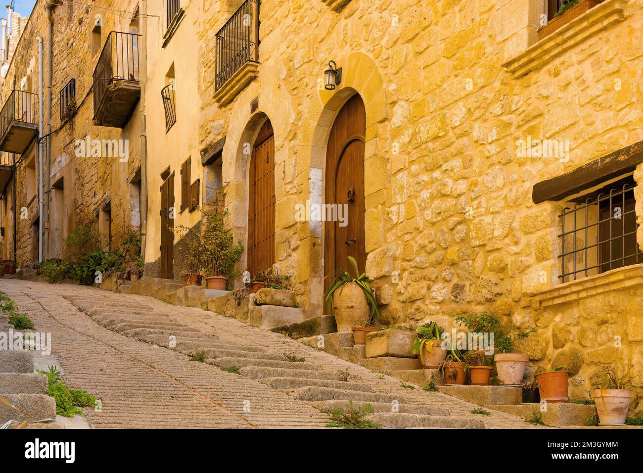 Street view of the historic center of Horta de Sant Joan, Catalonia ...