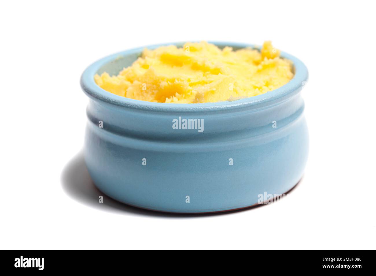 Ghee in a butter dish isolate on a white background Stock Photo - Alamy