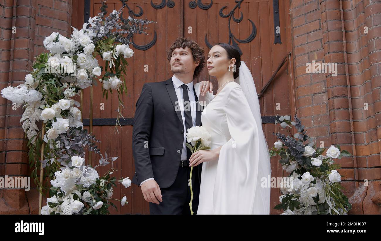 A bright and spectacular wedding couple. Action.Newlyweds where a bride ...