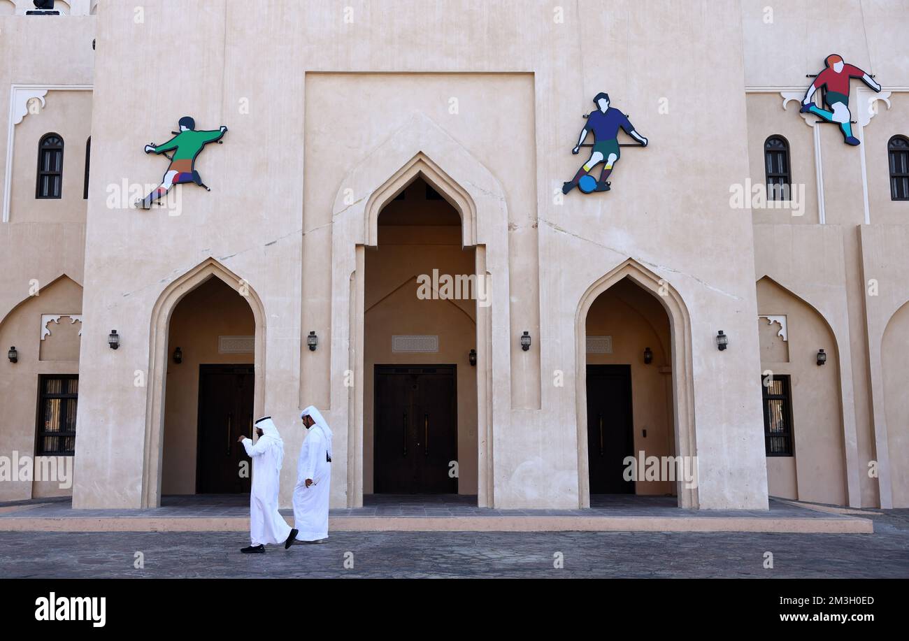 Doha, Qatar, 15th November 2022. Locals walk past buildings with ...