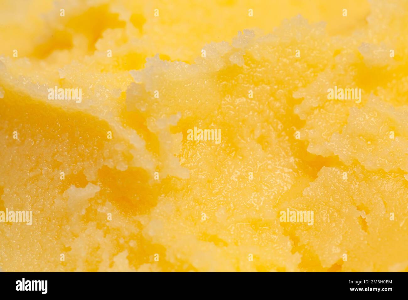 Homemade melted ghee clarified butter close up macro food background ...