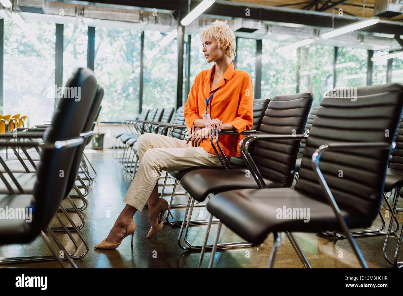 Cinematic image of a conference meeting. Business people sitting in a ...