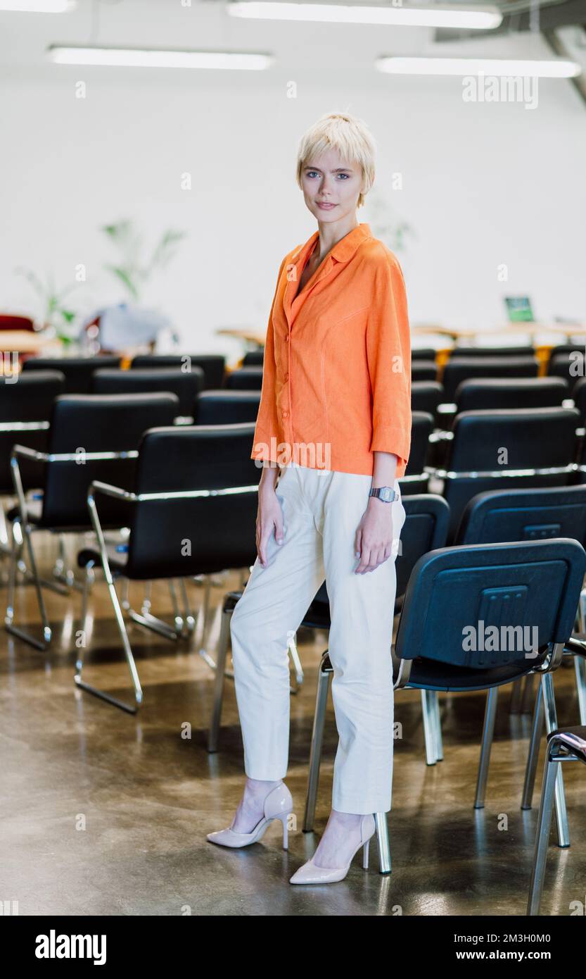 Cinematic image of a conference meeting. Business people sitting in a ...