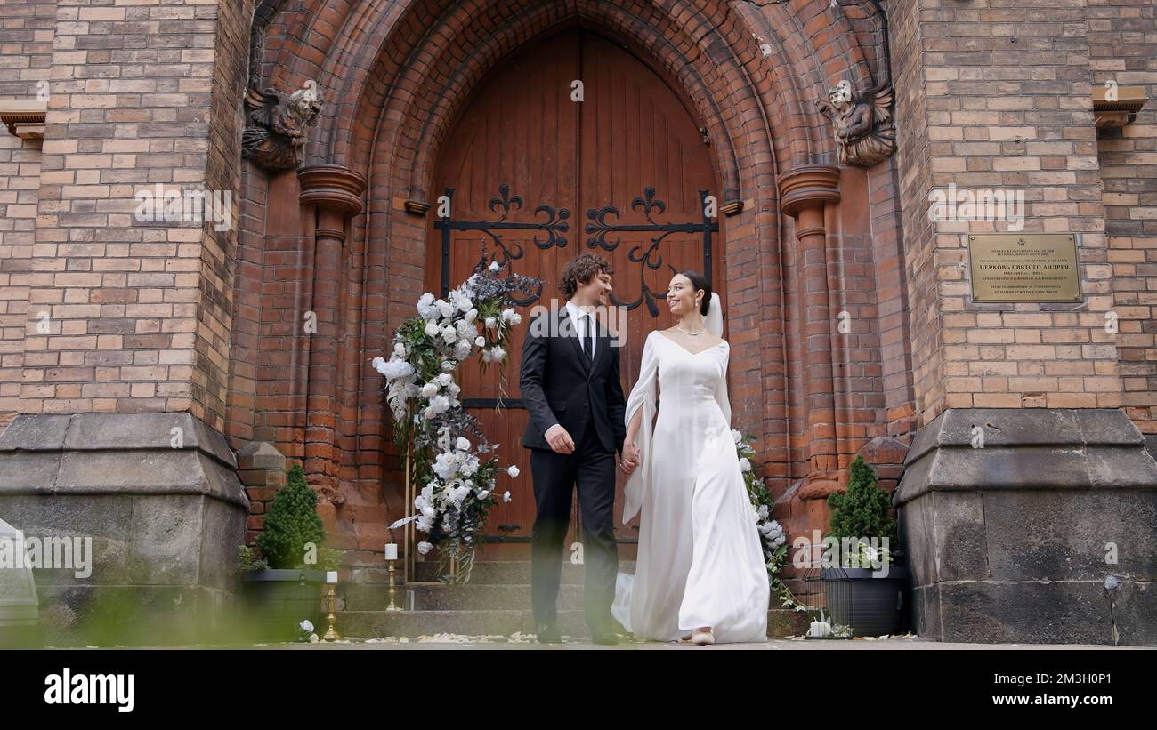 A bright and spectacular wedding couple. Action.Newlyweds where a bride ...