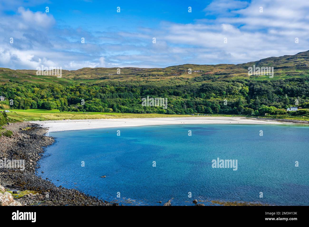 View looking down on Calgary Bay, with the expanse of white sand of ...