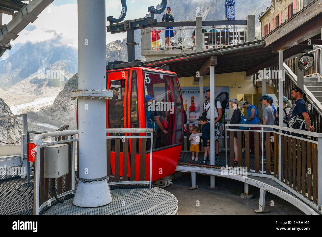 Cable car of Montenvers taking tourists from the rack railway station ...