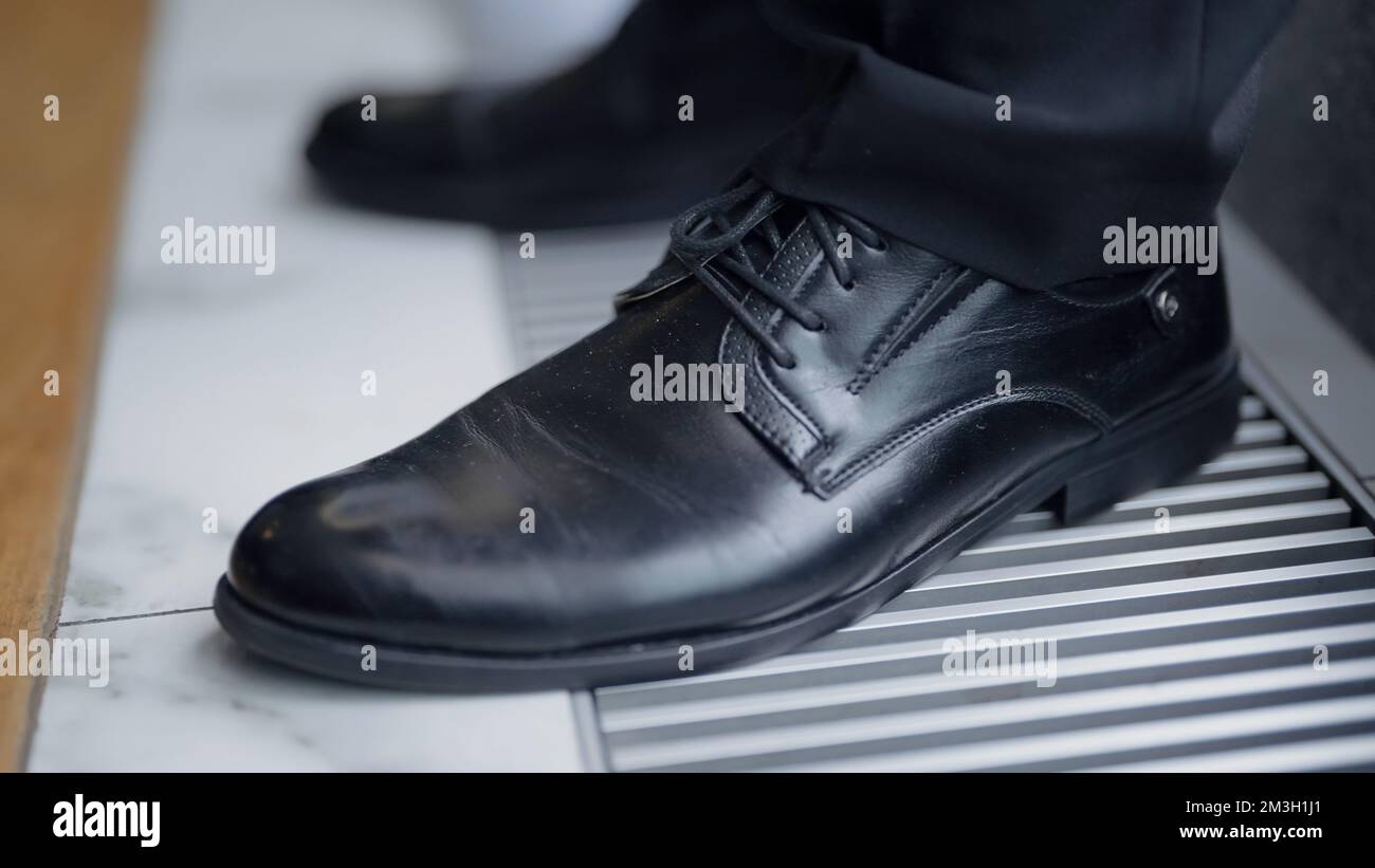 Black leather shoes. Action . Big dark elegant leather clean shoes ...