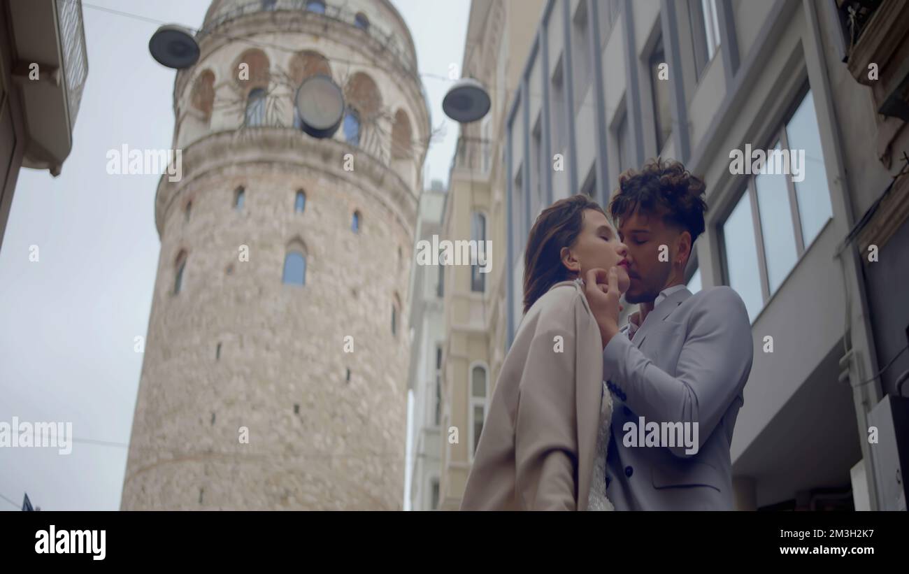 A couple embracing through the eyes of a photographer. Action.Newlyweds ...