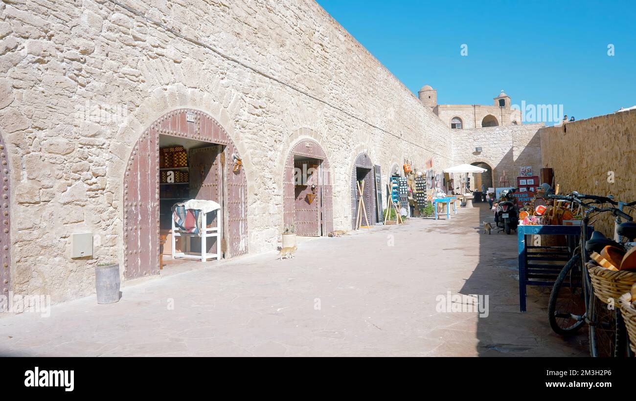 Street with turkish bazaar under the hot shining sun. Action. Empty ...