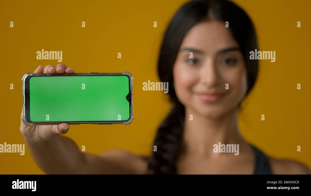 Female holding horizontal green screen hi-res stock photography and images - Alamy