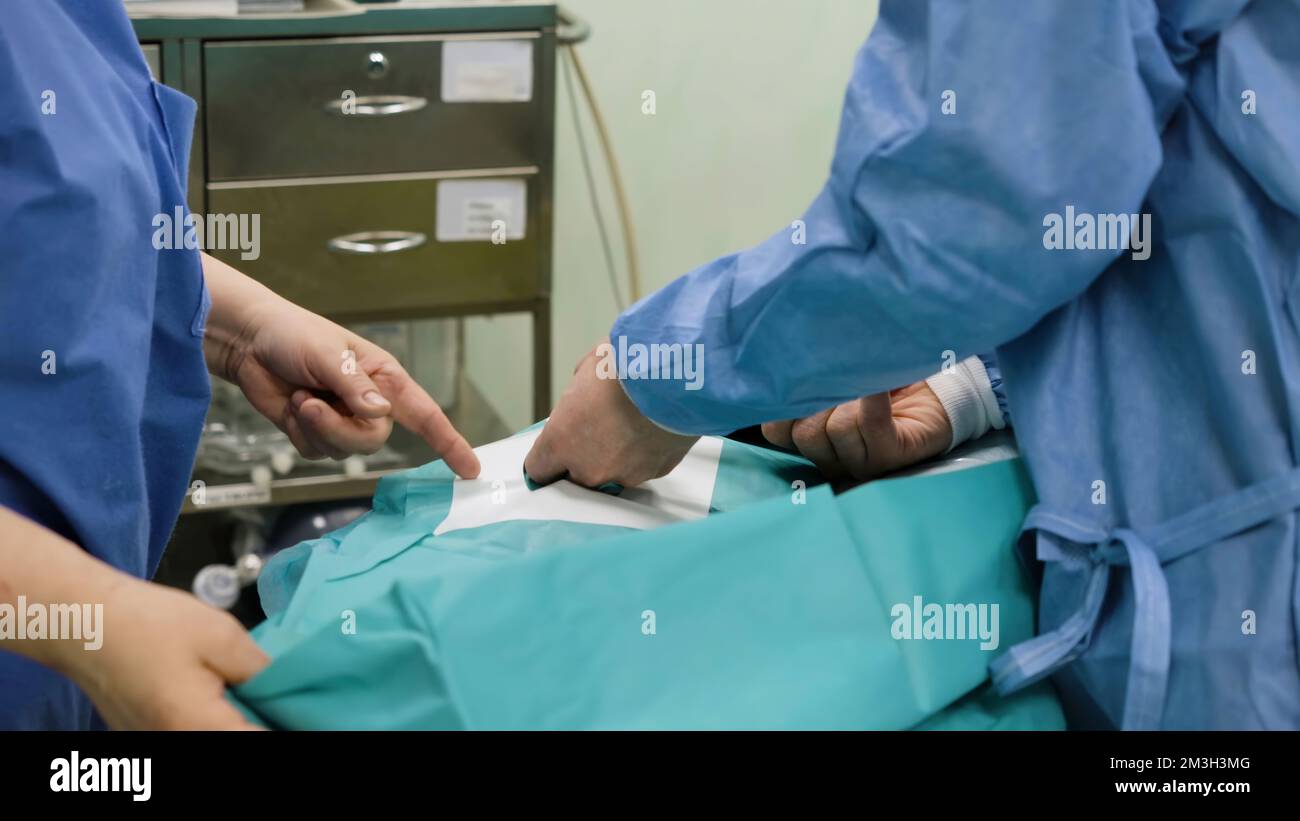 Pregnant person in operating room hi-res stock photography and images ...