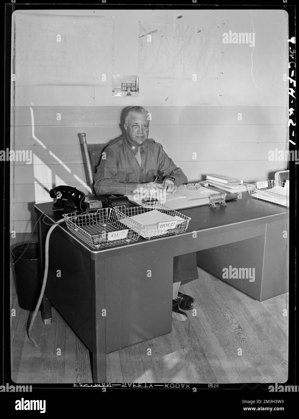 Military officer seated at desk , Military officers. Jack Miller ...