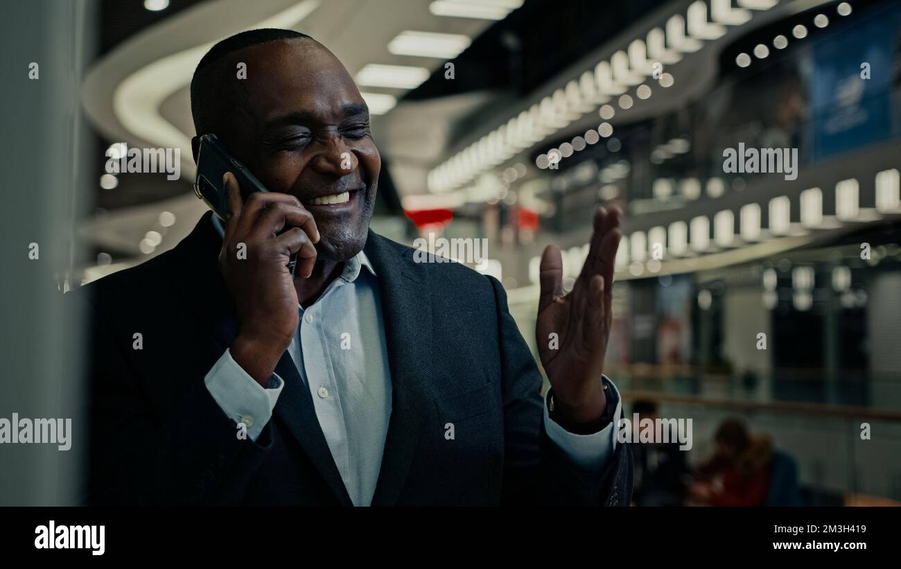 Cheerful african man calling phone hi-res stock photography and images ...