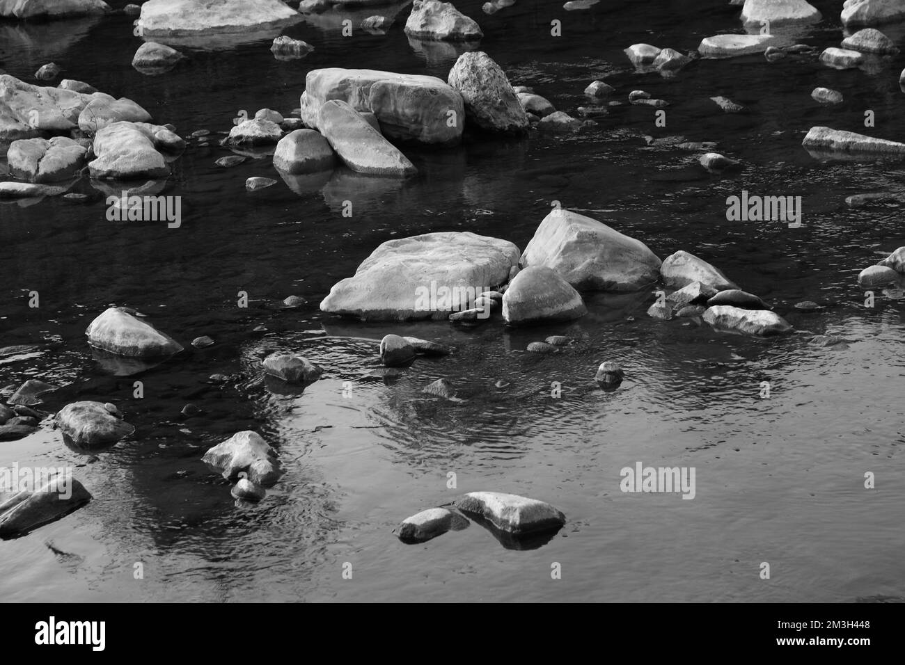 rocks in the river in tuscany Stock Photo - Alamy