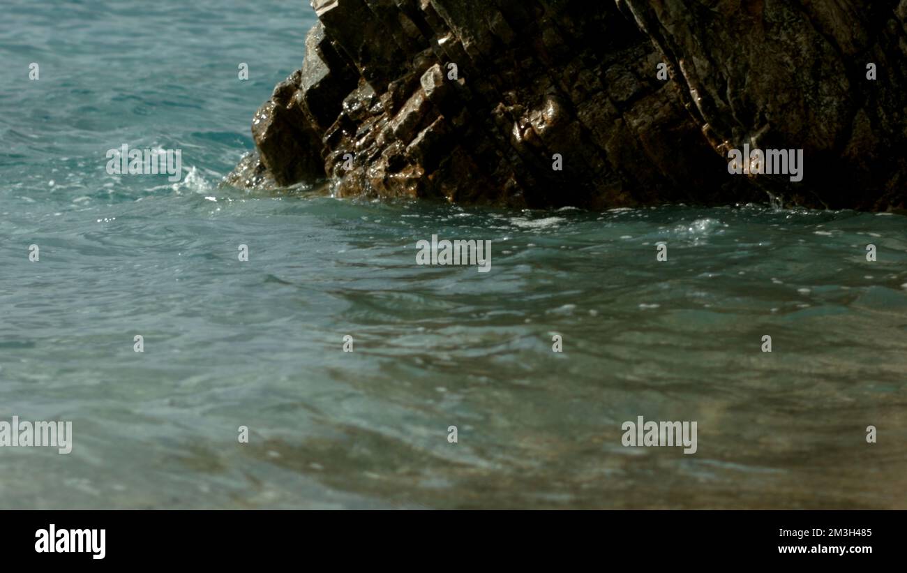 Smelling the sea. Creative.Waves of blue transparent sea beating ...