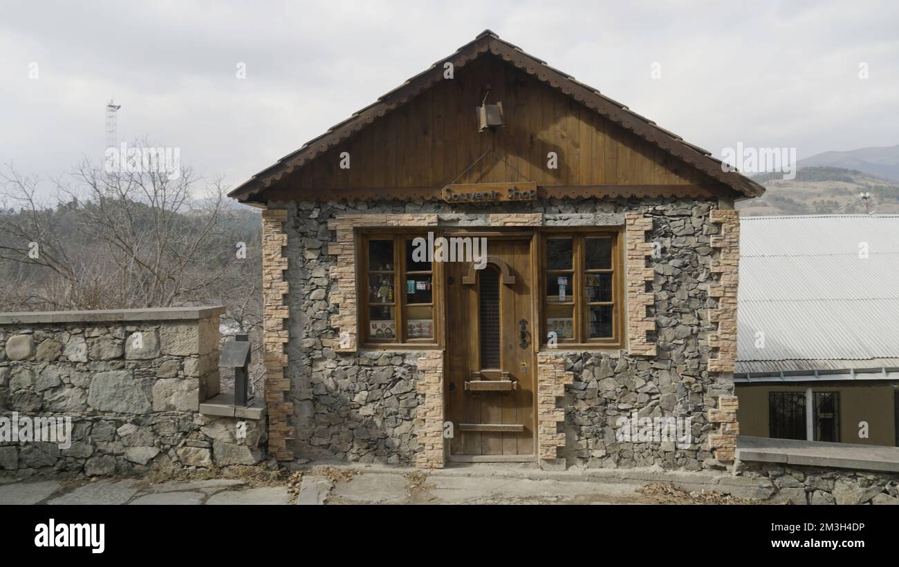 Brown wooden church . Action . A small religious house located next to ...