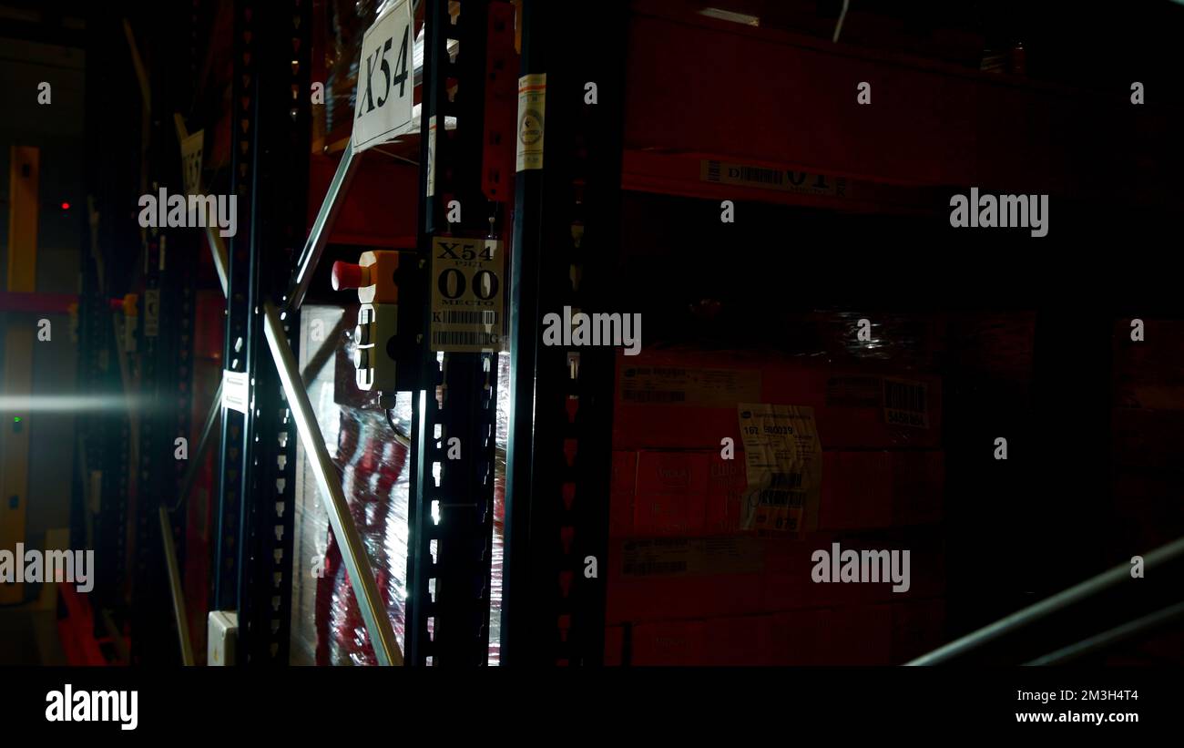 Protected parcels. Creative.Large boxes next to the red security button ...