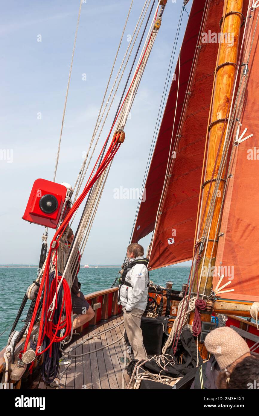 Aboard the traditional gaff cutter "Jolie Brise", running downwind in ...