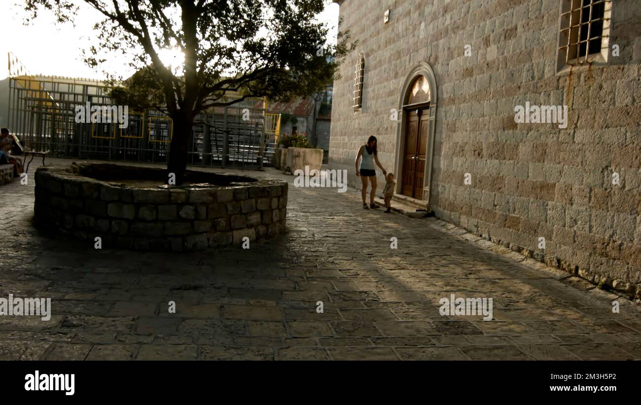 Beautiful landscapes near old landmarks . Creative . Tourists walking ...