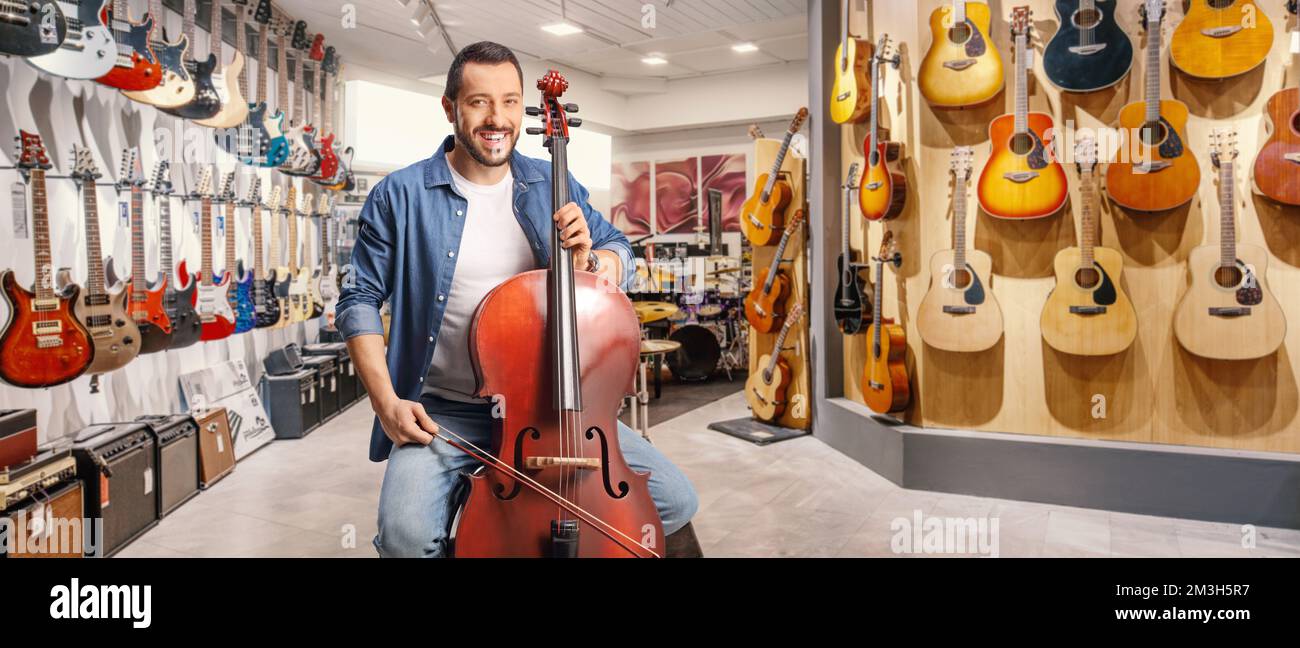 Man with string instruments hi-res stock photography and images - Alamy