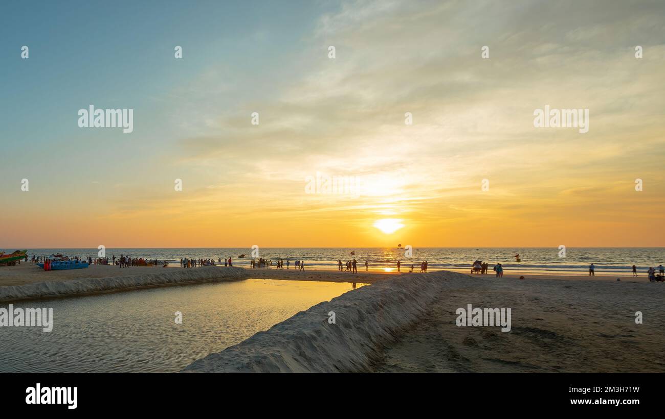 Beautiful sunset on the beach Colva Beach - South Goa, India Stock ...