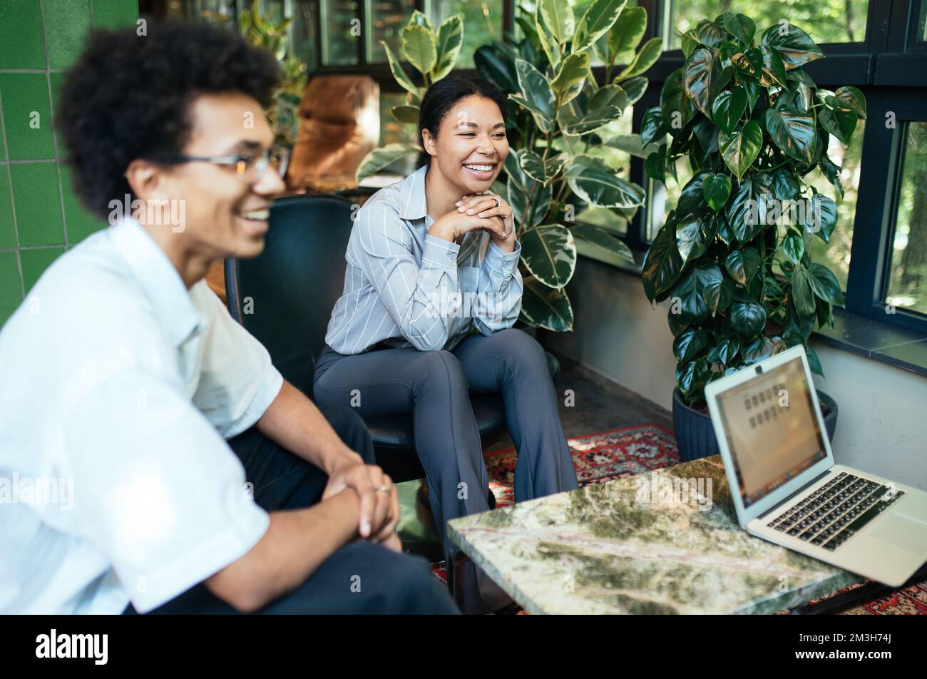 cinematic image of people working in a start up business. Multiethnic ...