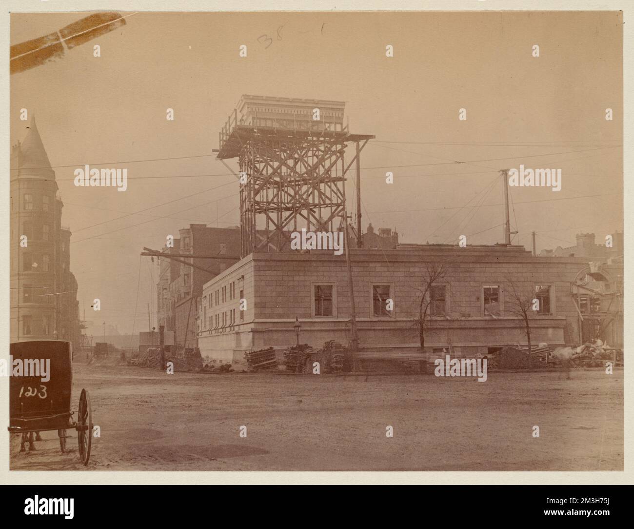 Mock-up of cornice on scaffolding, construction of the McKim Building ...