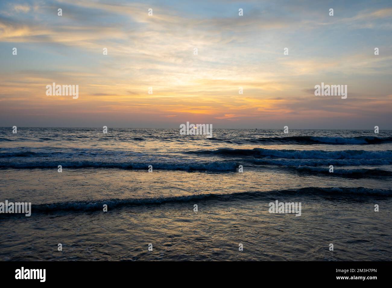 Beautiful sunset on the beach Colva Beach - South Goa, India Stock ...