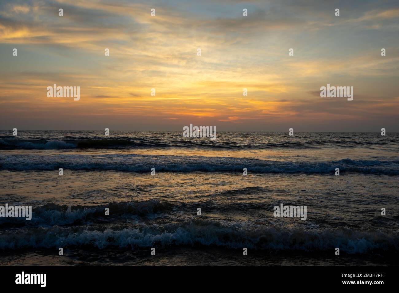 Beautiful sunset on the beach Colva Beach - South Goa, India Stock ...