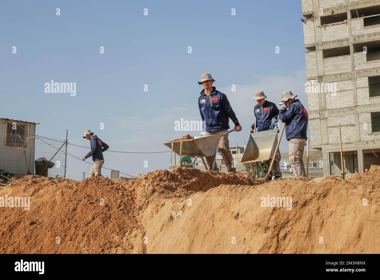 A Palestinian excavation team works in a newly discovered Roman-era ...