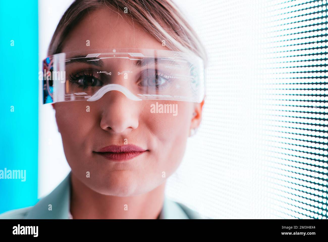 business woman with cyborg bionic arm and augmented reality visor ...