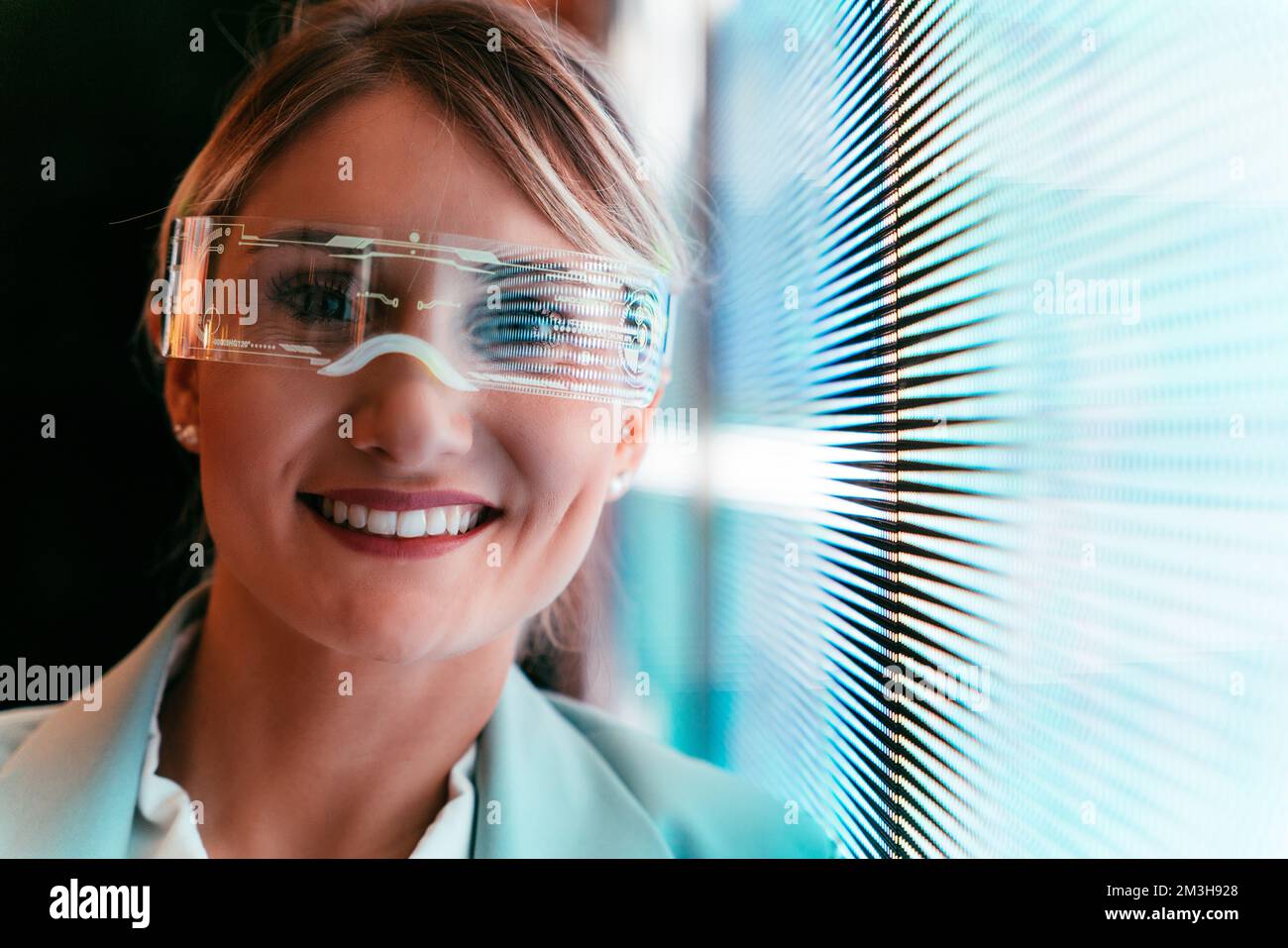 business woman with cyborg bionic arm and augmented reality visor. Representation of the future ...