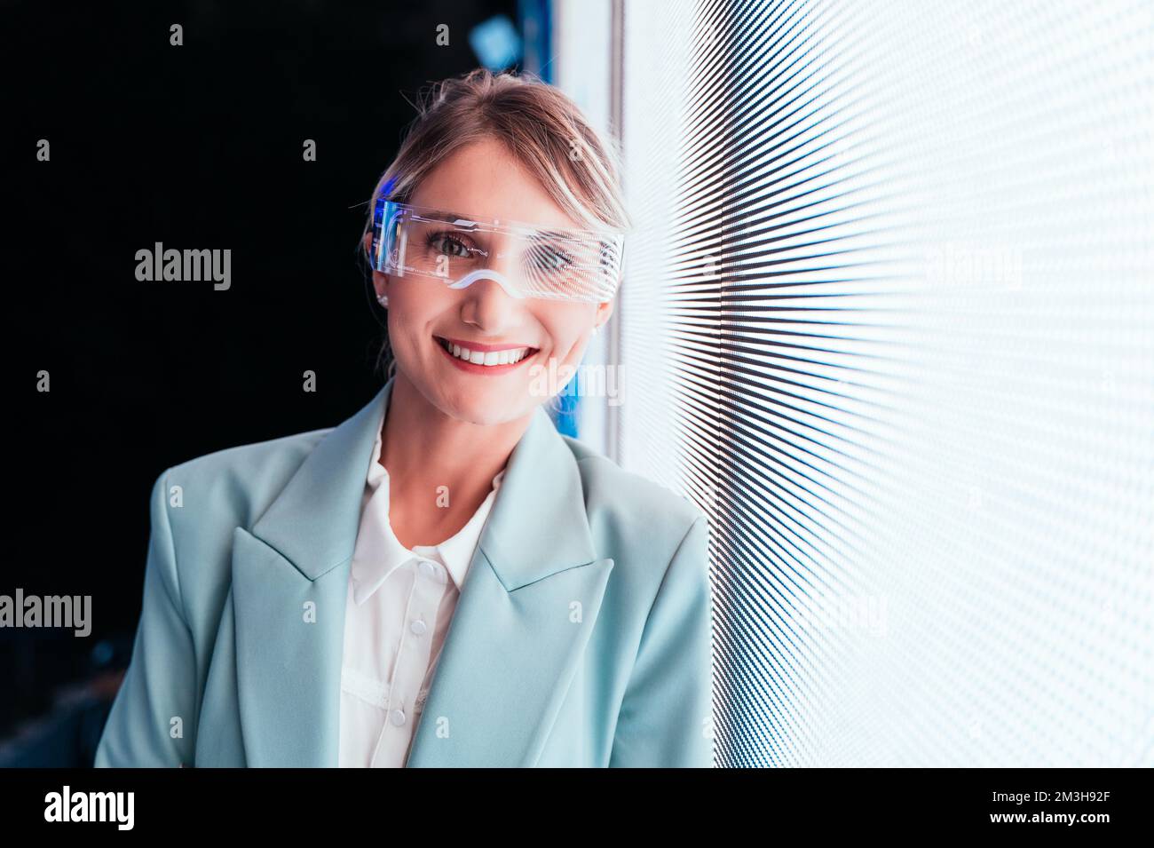 business woman with cyborg bionic arm and augmented reality visor. Representation of the future ...