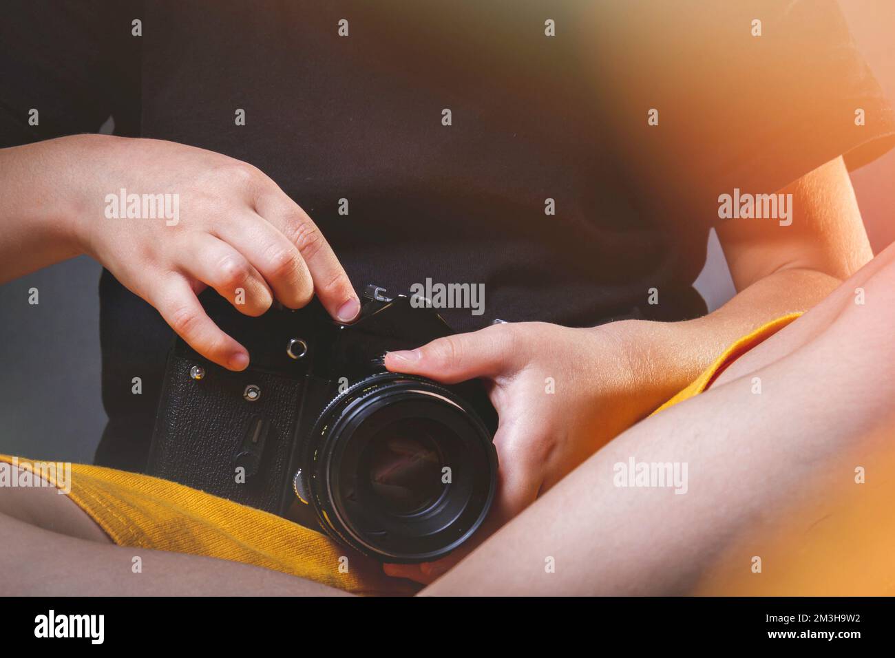 Baby and vintage camera. Beginner photographer. Photography courses ...