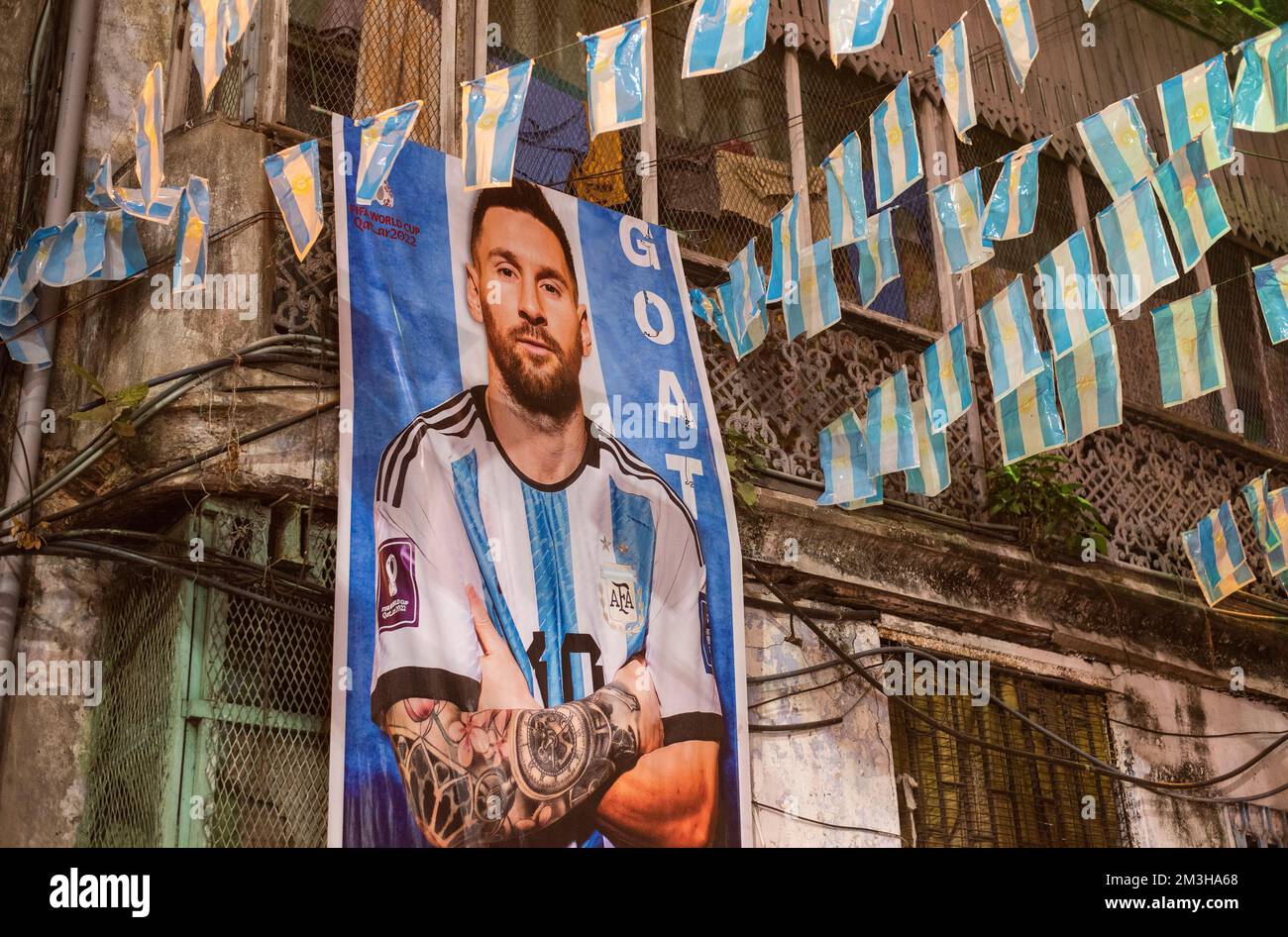 KOLKATA, INDIA - DECEMBER 12: A poster of Lionel Messi at a street ...