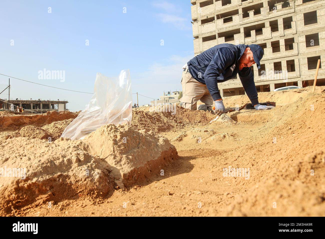 Gaza, Palestine. 15th Dec, 2022. A Palestinian worker works in a newly ...