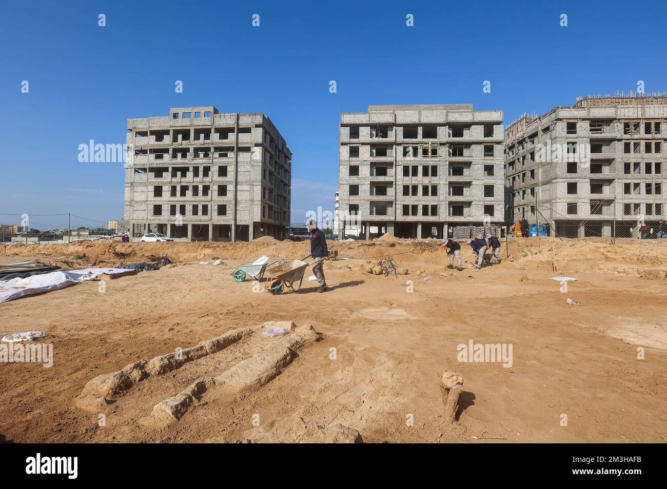 Gaza, Palestine. 15th Dec, 2022. A Palestinian excavation team works in ...