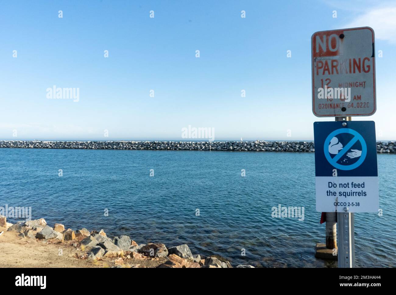 the warning signs on the Dana Point Bay in California Stock Photo - Alamy