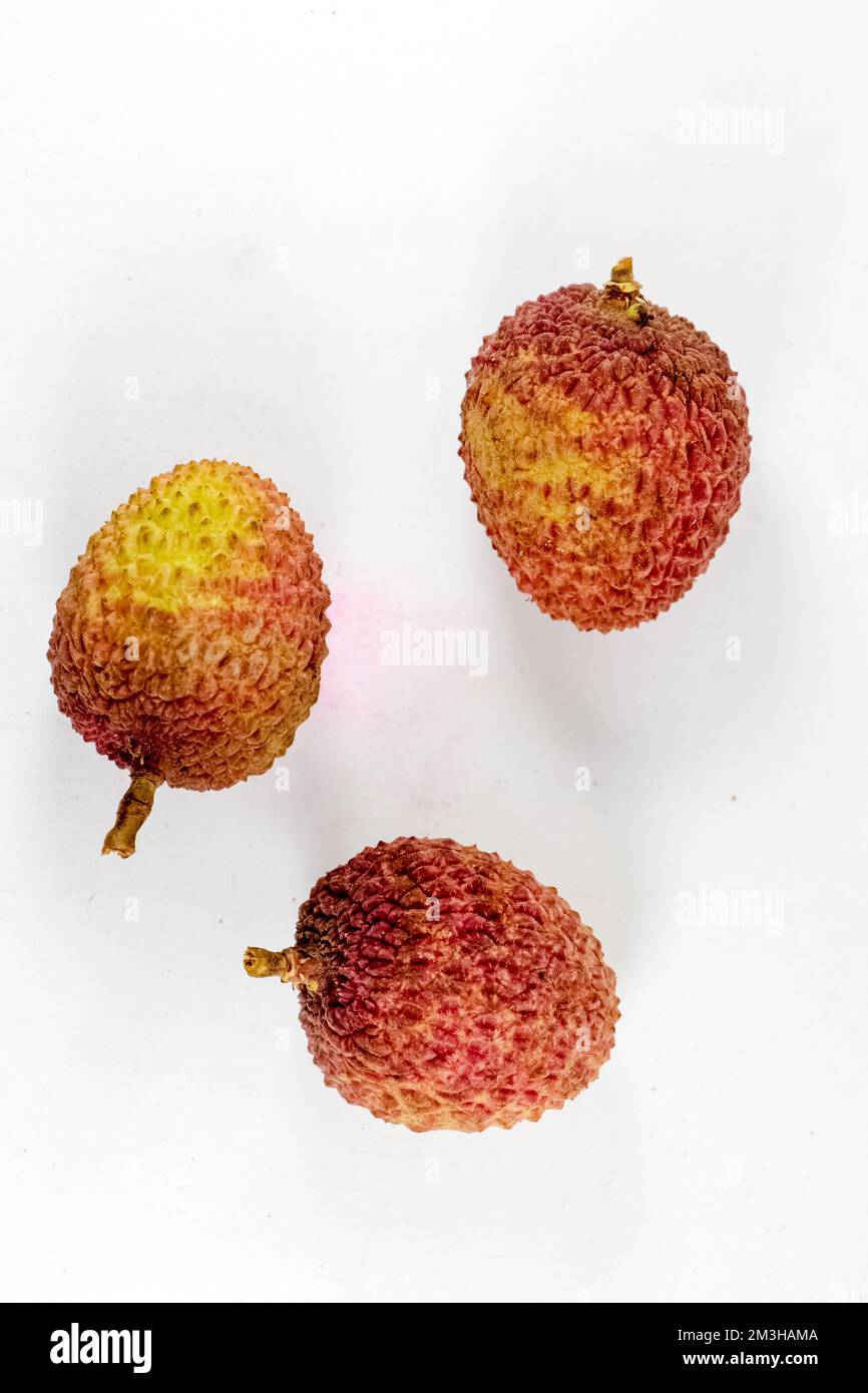 A bunch of pink lychee fruit isolated on white background Stock Photo ...